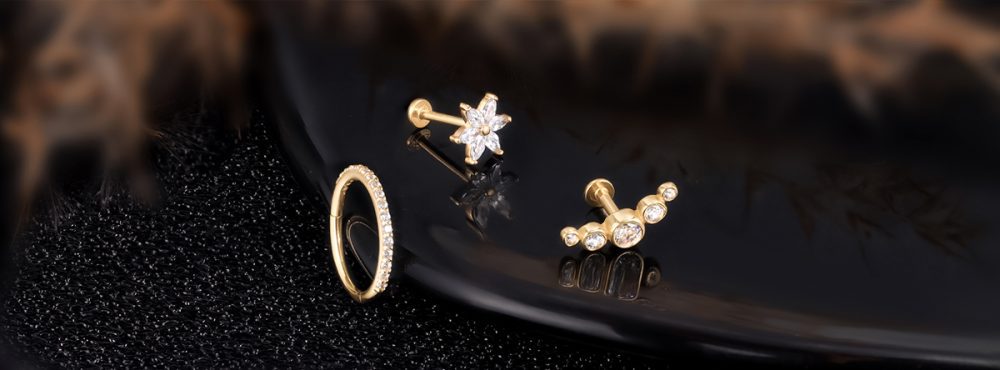 Embrace Elegance with 14K Gold Eyebrow Piercings | Gold Piercing Factory